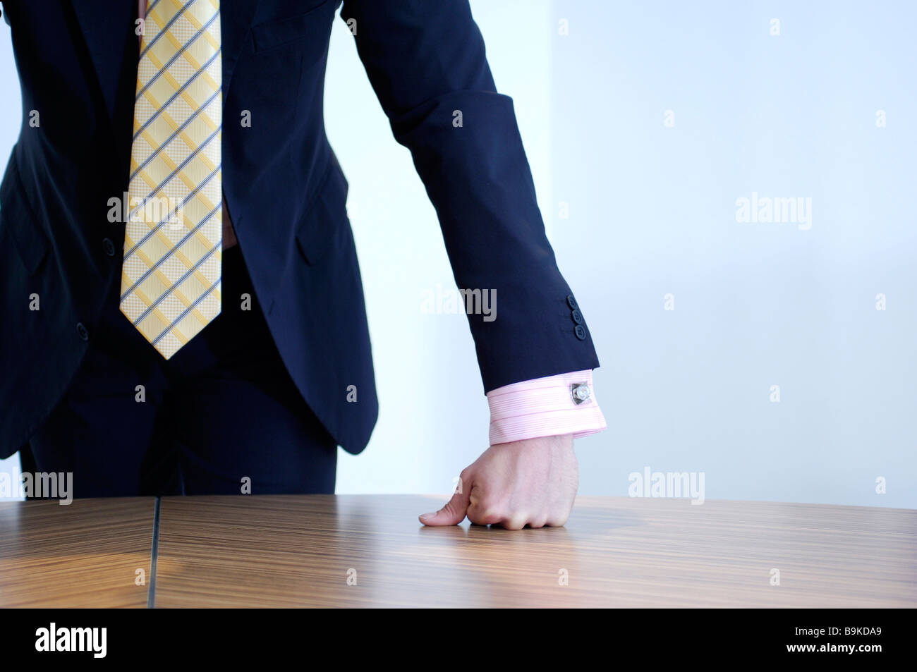 detail of smart dressed executive putting hands on table Stock Photo ...