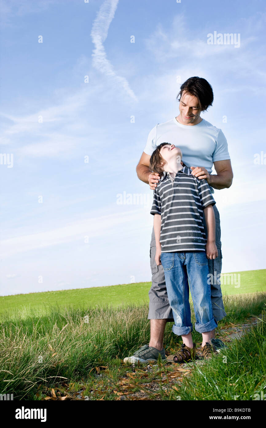 young father and his looking at each other Stock Photo - Alamy