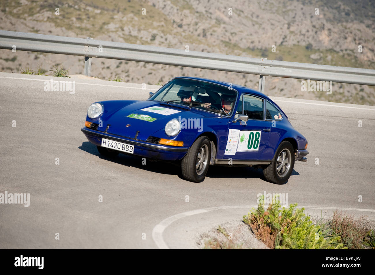 Blue 1973 Porsche 911T sports car racing in the Classic car rally ...