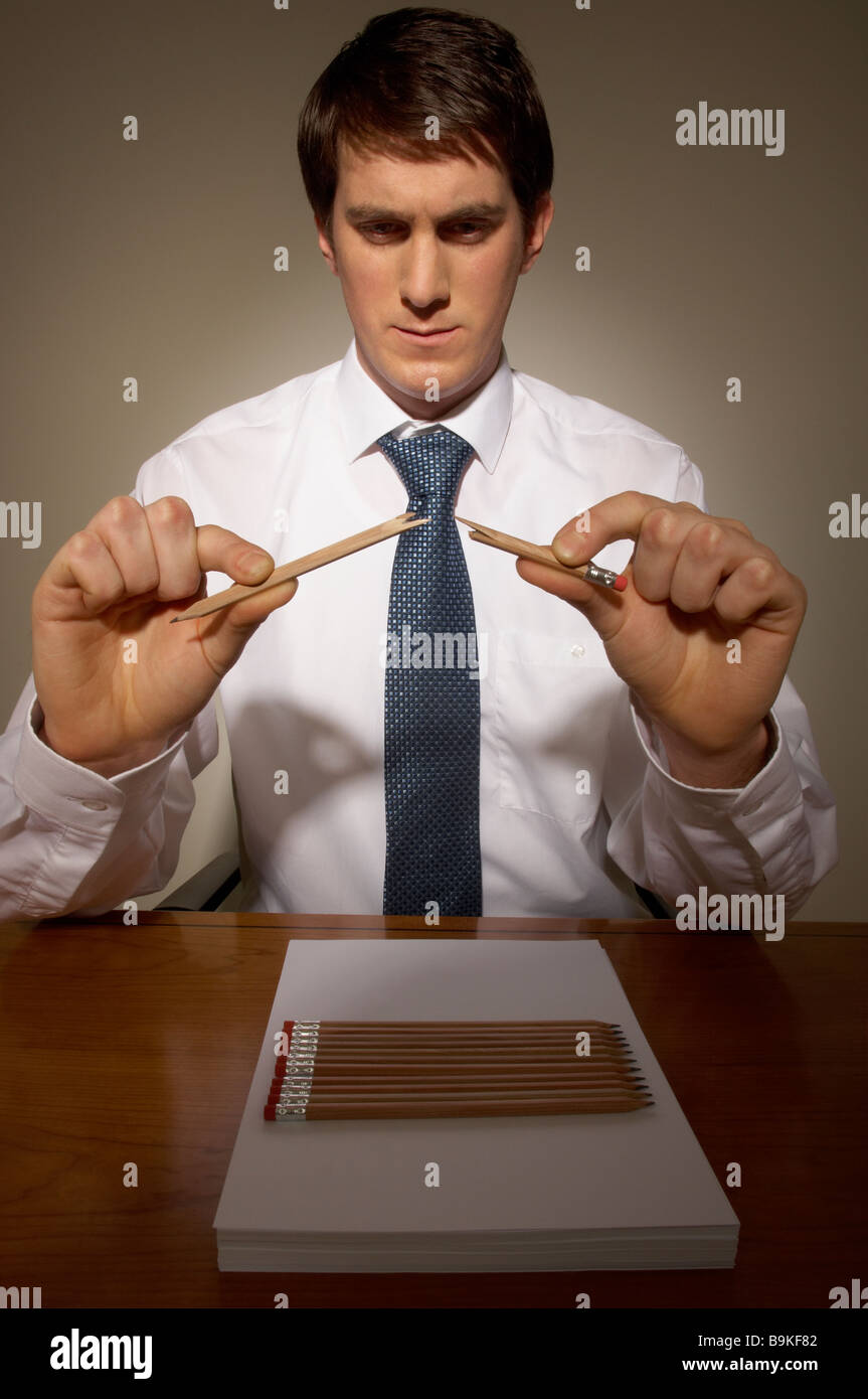 Businessman breaking pencil hi-res stock photography and images - Alamy