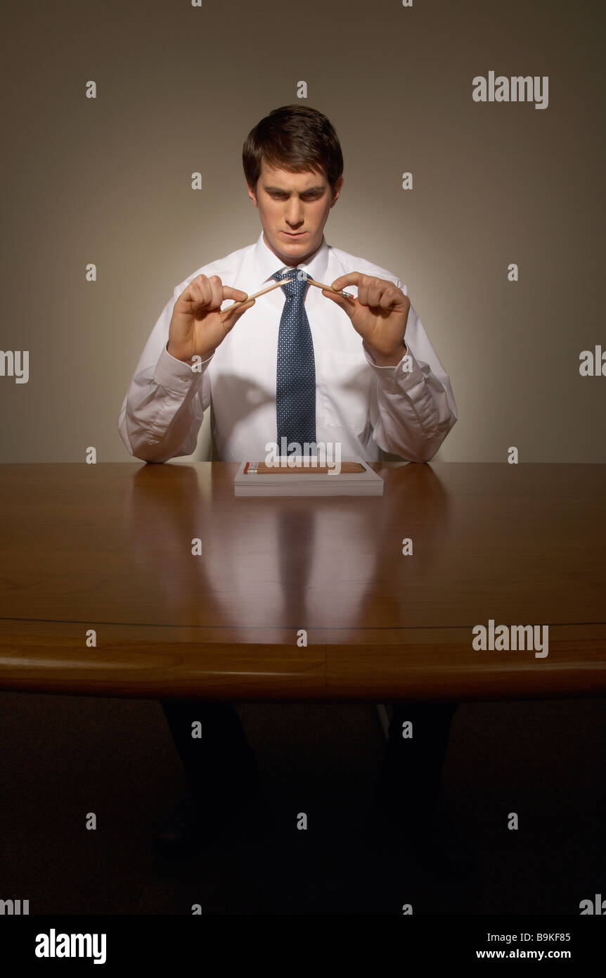 Man breaking pencil hi-res stock photography and images - Alamy