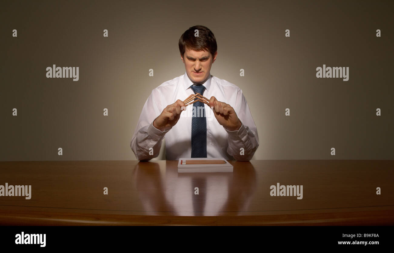 Businessman breaking pencil hi-res stock photography and images - Alamy