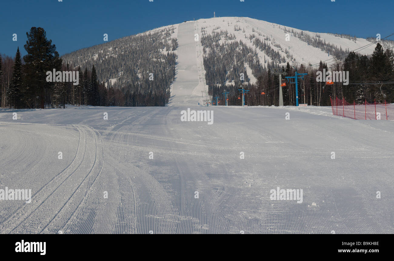 Long slope for skiing and snowboarding with elevator Stock Photo - Alamy