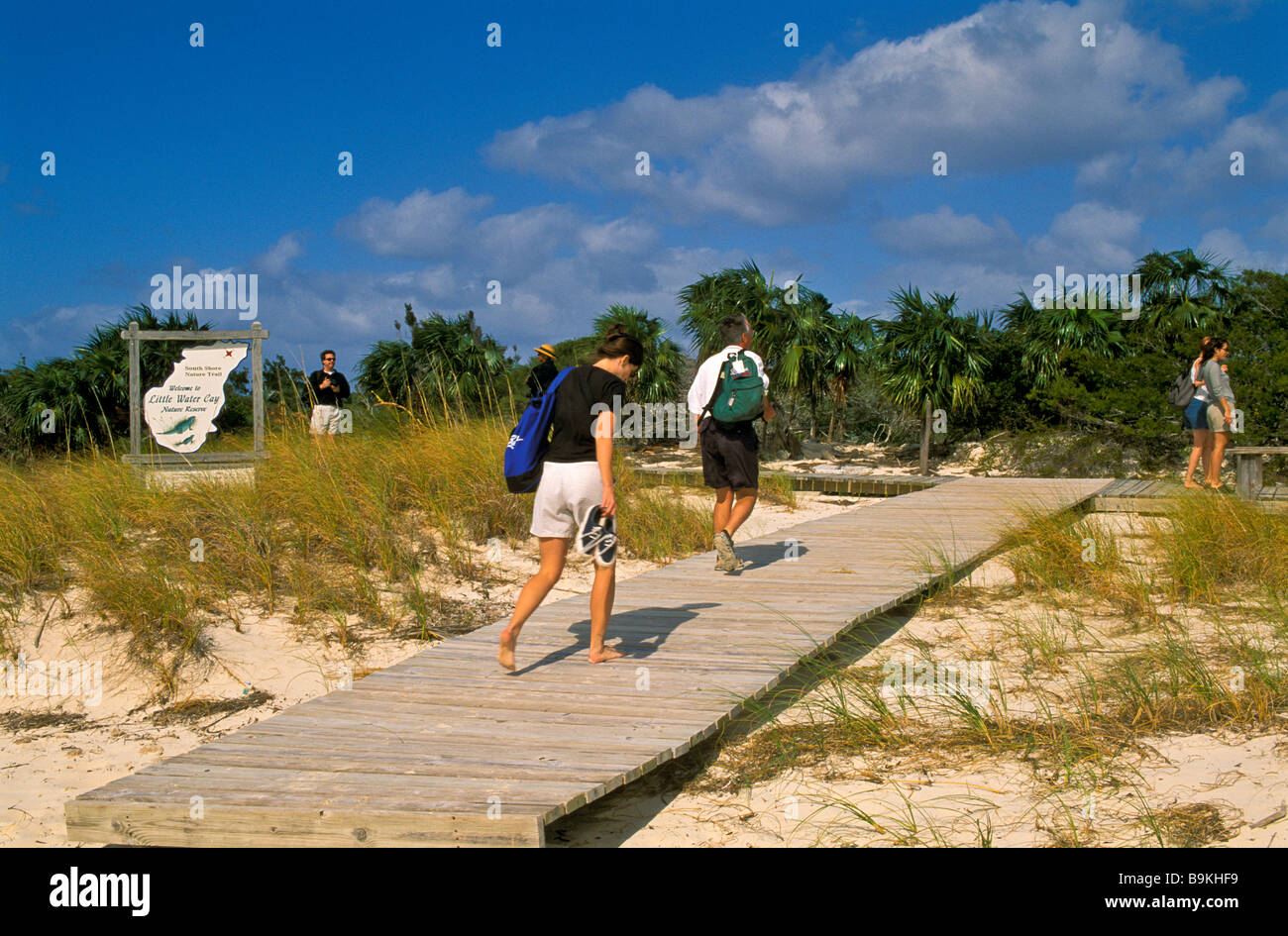 Little Water Cay tourists on boardwalk at nature reserve wildlife ...