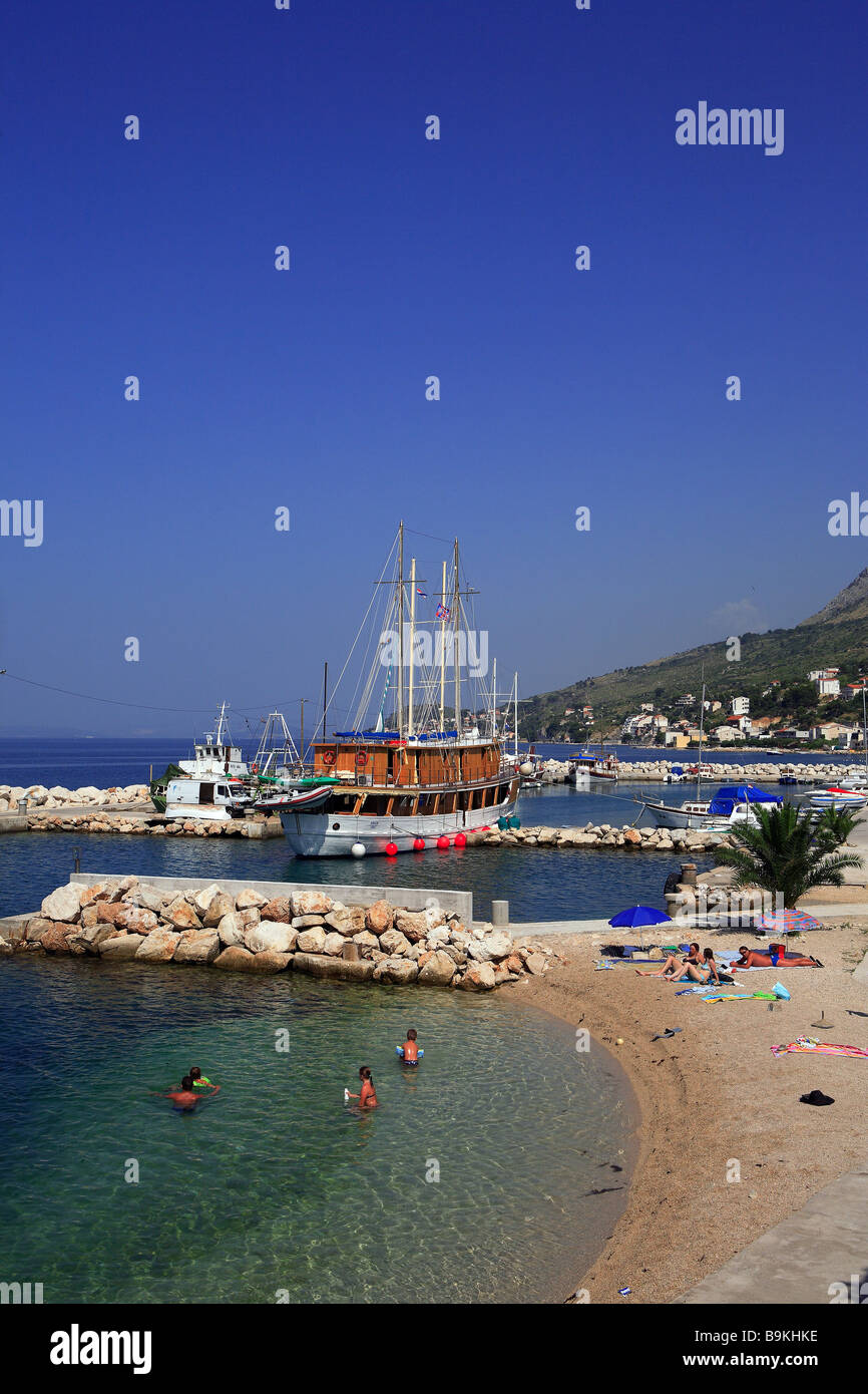 Croatia, Dalmatia, Dalmatian coast, Dugi Rat village beach Stock Photo ...