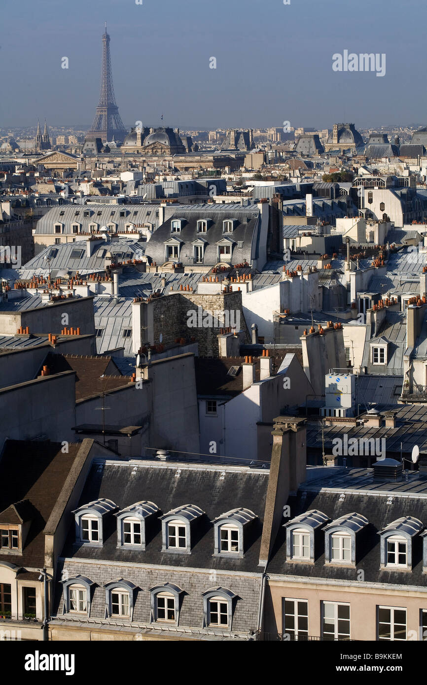 France, Paris, rooftops and the Eiffel Tower in the background seen ...