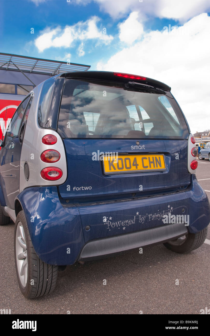 A small tiny smart fortwo car in a uk car park Stock Photo - Alamy