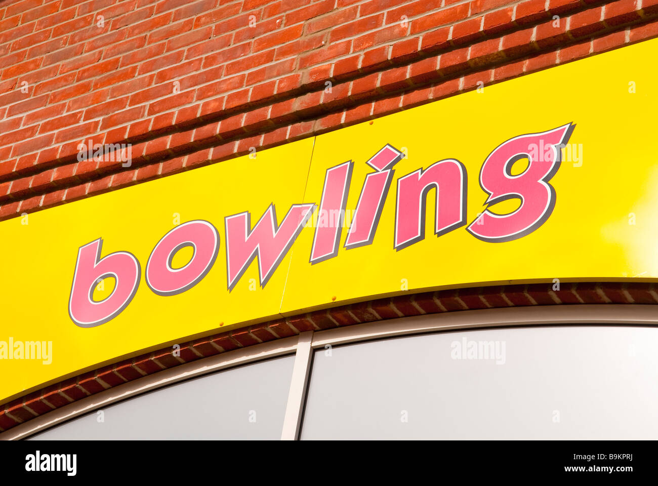A bowling advertising sign Stock Photo - Alamy