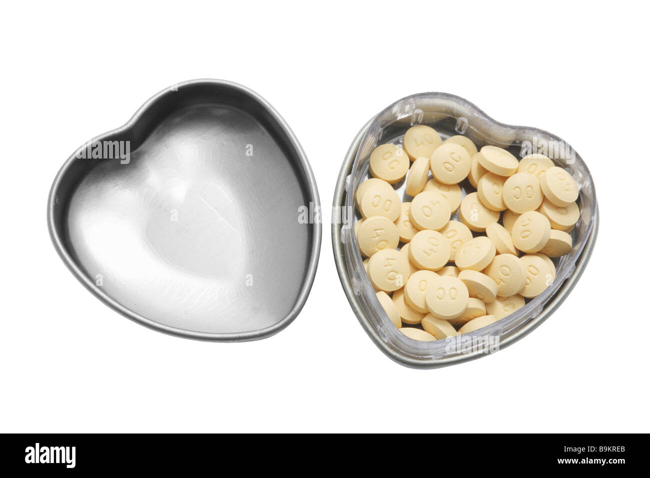 Pills in Heart Shaped Box Stock Photo - Alamy