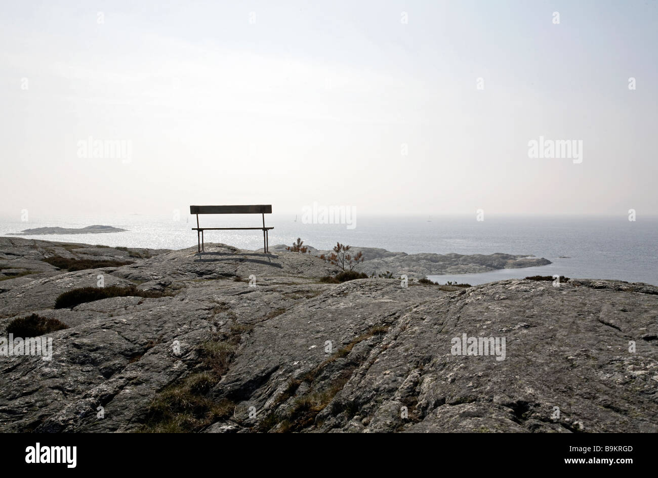 Bench on the rocks at the seaside, Marstrand, Sweden Stock Photo - Alamy