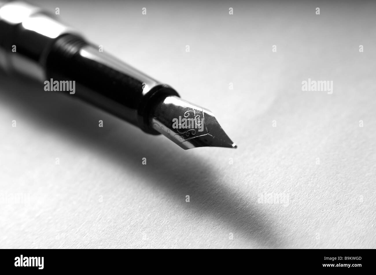 Pen on a paper Stock Photo - Alamy