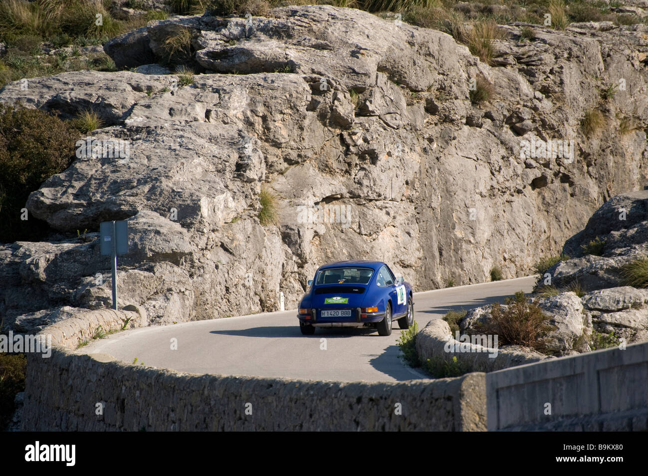 Rear view of a blue 1973 Porsche 911T sports car racing in the Classic ...