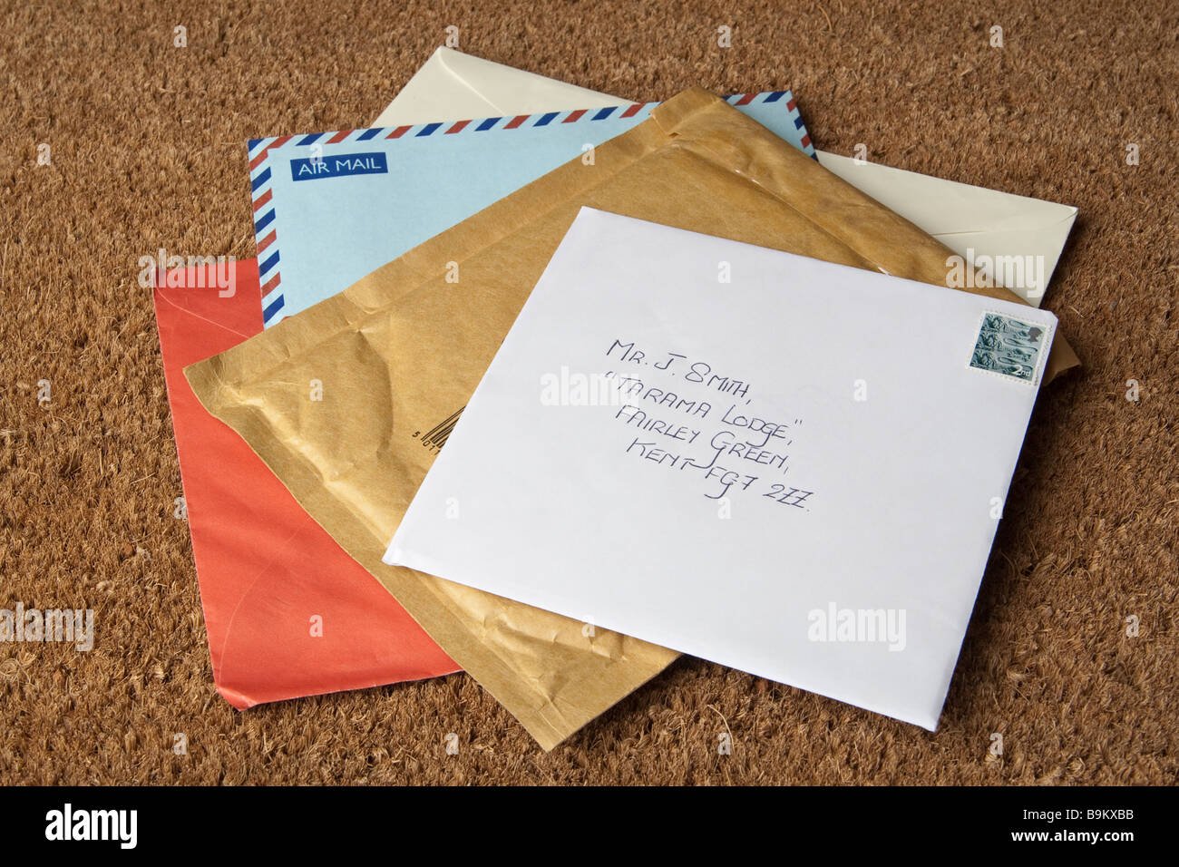 Letters on the mat, UK Stock Photo - Alamy