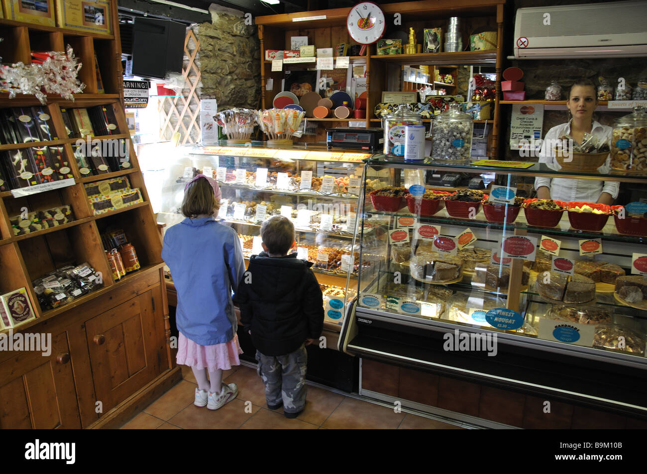Children inside chocolate sweet shop Stock Photo - Alamy