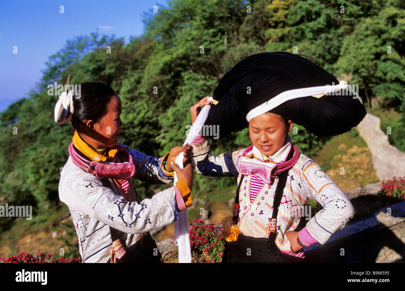 China, Guizhou province, Longhorn Miaos ethnic group wearing wool and ...