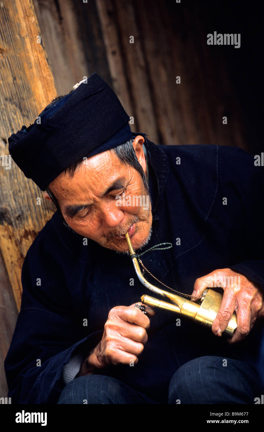 China, the smoker Stock Photo - Alamy