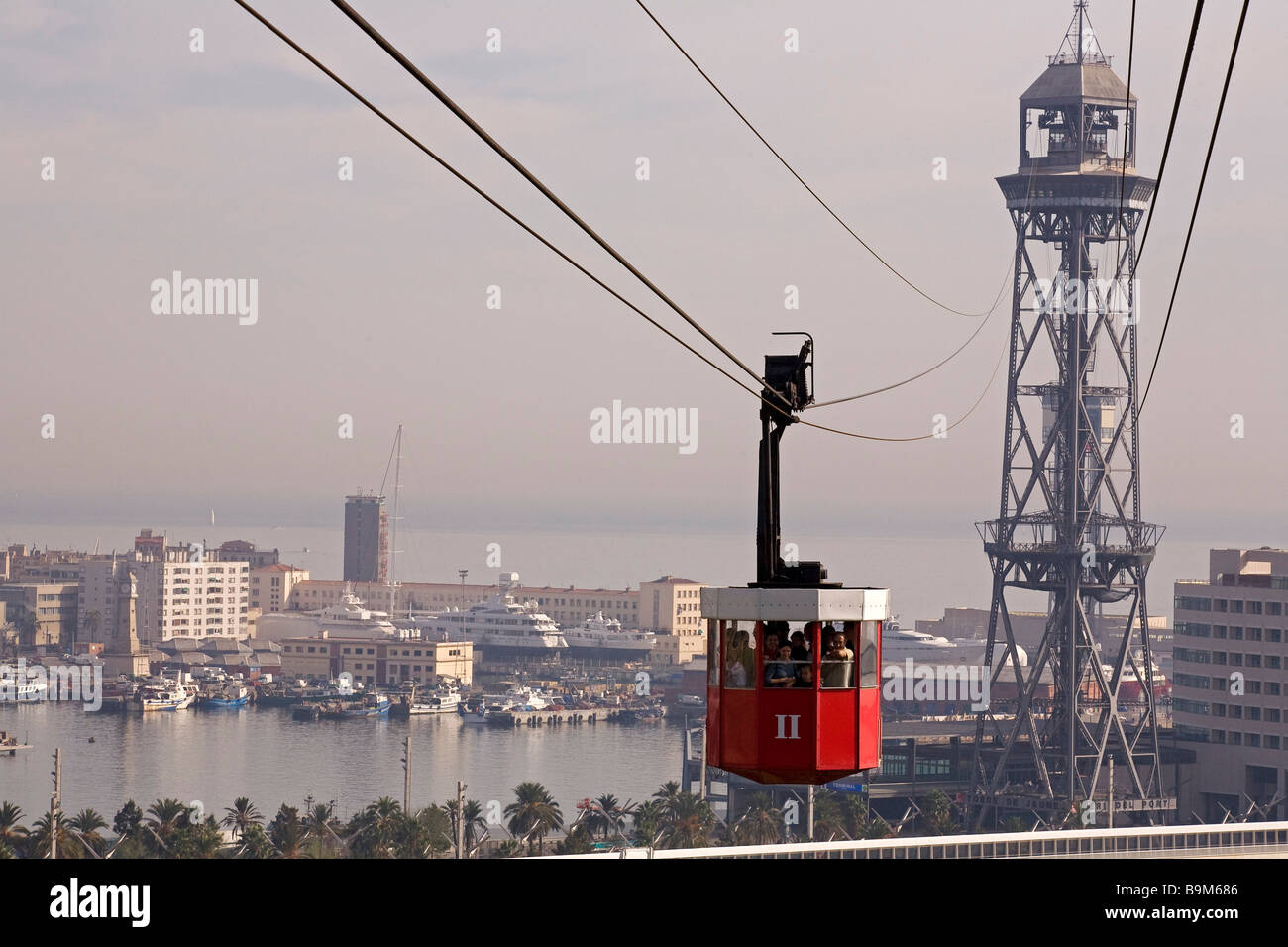 Spain, Catalunya, Barcelona, Montjuic cable car crossing over the new ...