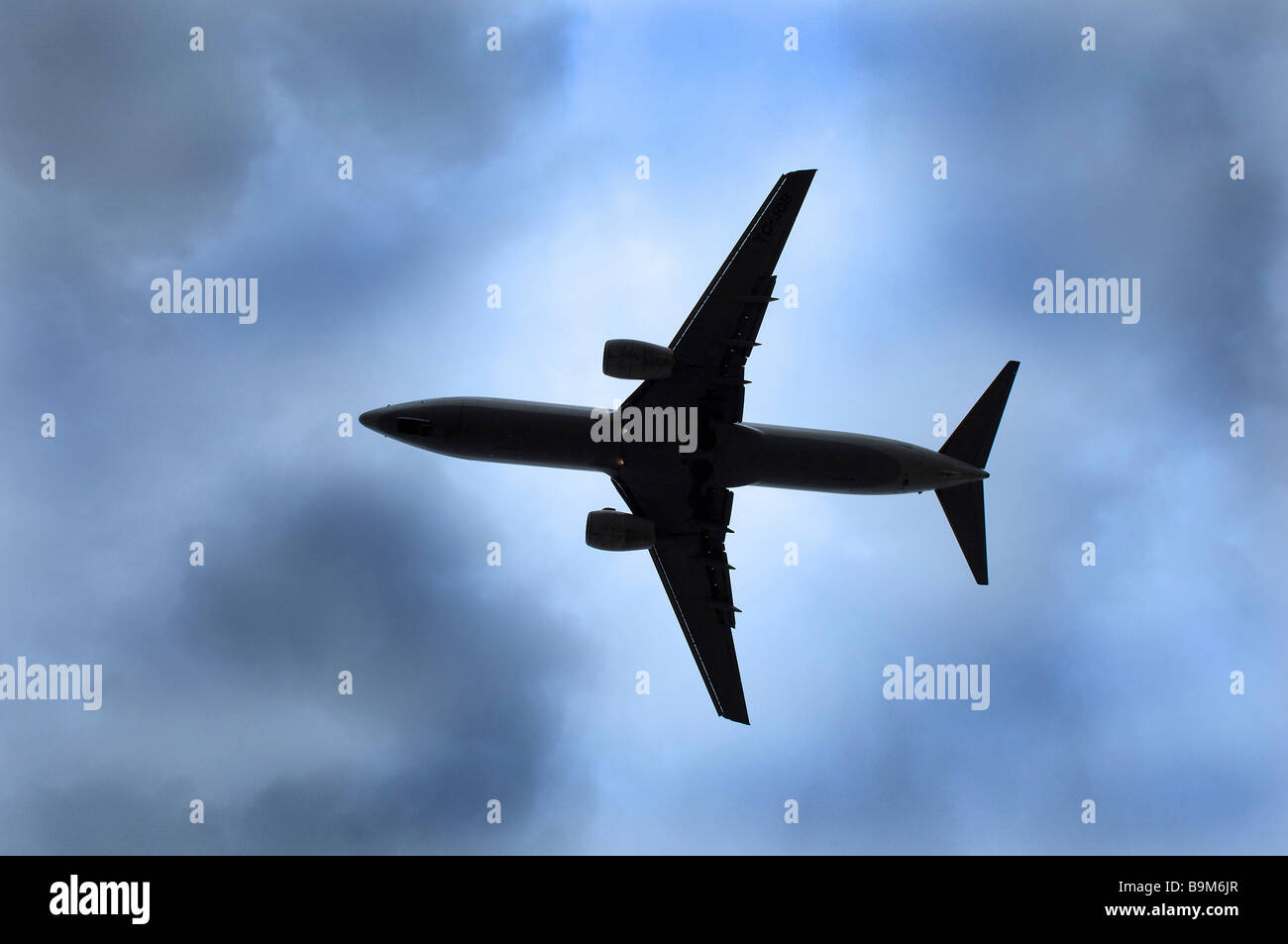 A plane seen from the ground Stock Photo - Alamy