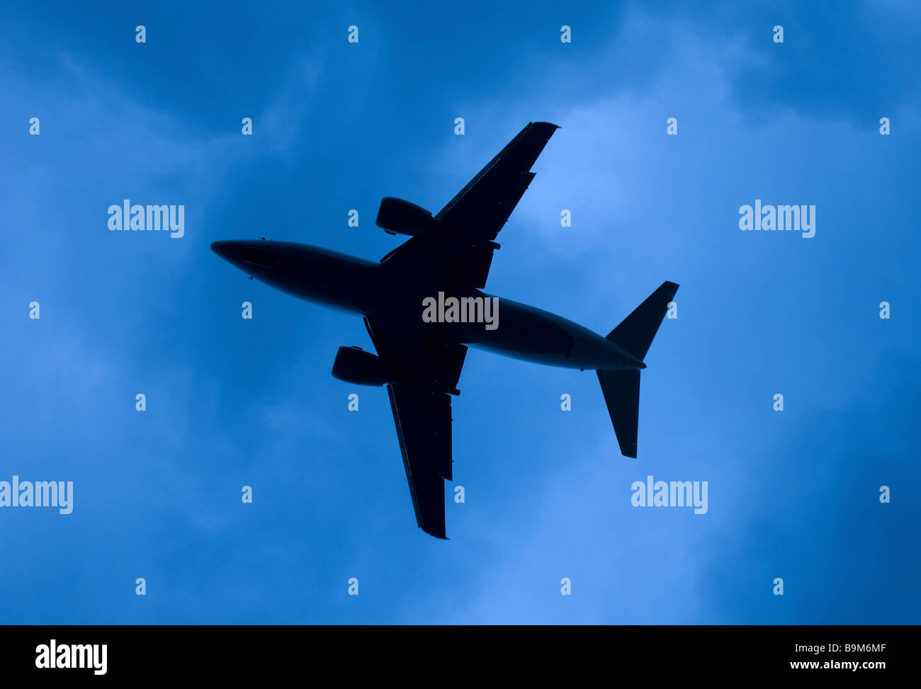 A plane seen from the ground Stock Photo - Alamy
