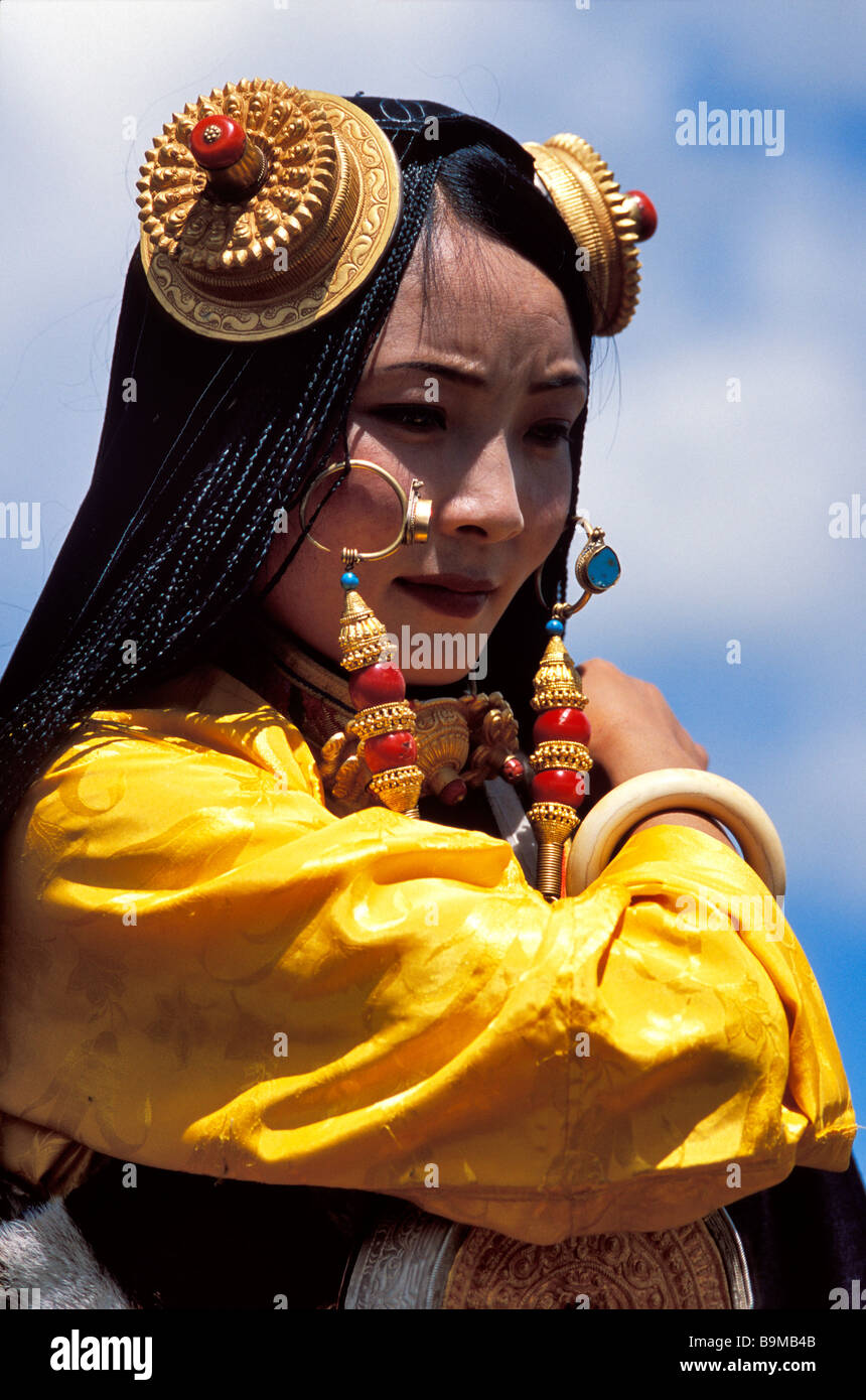 China, Sichuan province, Litang, a Khampas woman wearing traditional ...