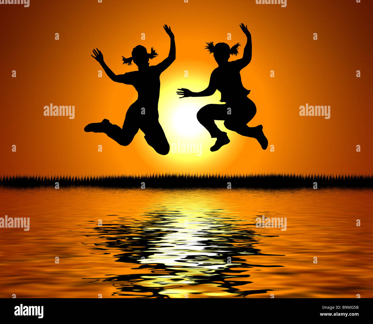 jumping on sunset Stock Photo - Alamy