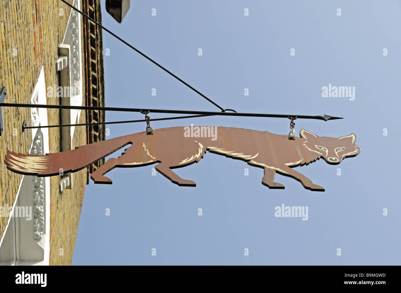 The Fox Reformed cut out fox shaped wine bar sign against blue sky ...
