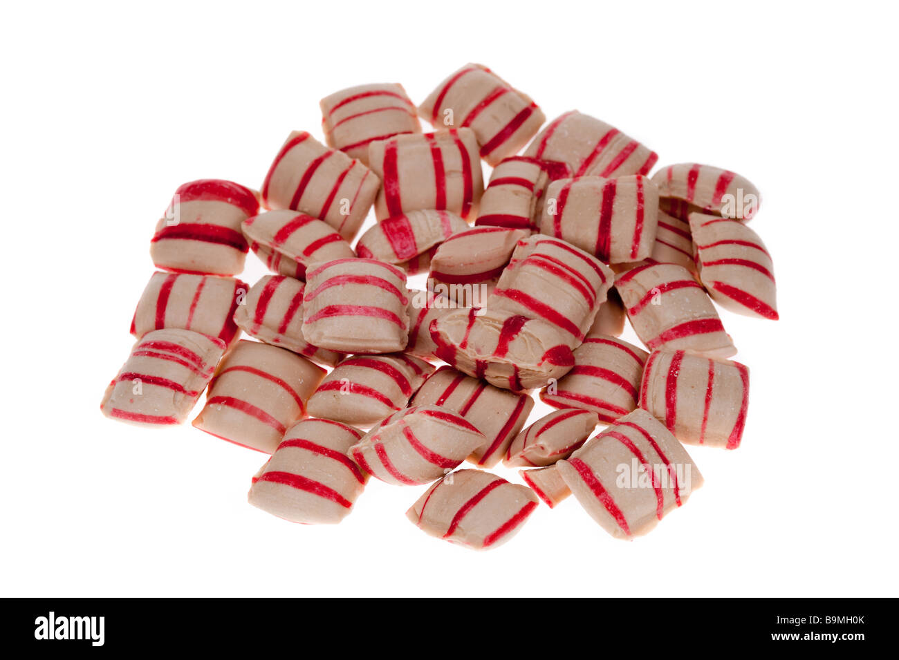 cinnamon candies isolated on a white background Stock Photo - Alamy