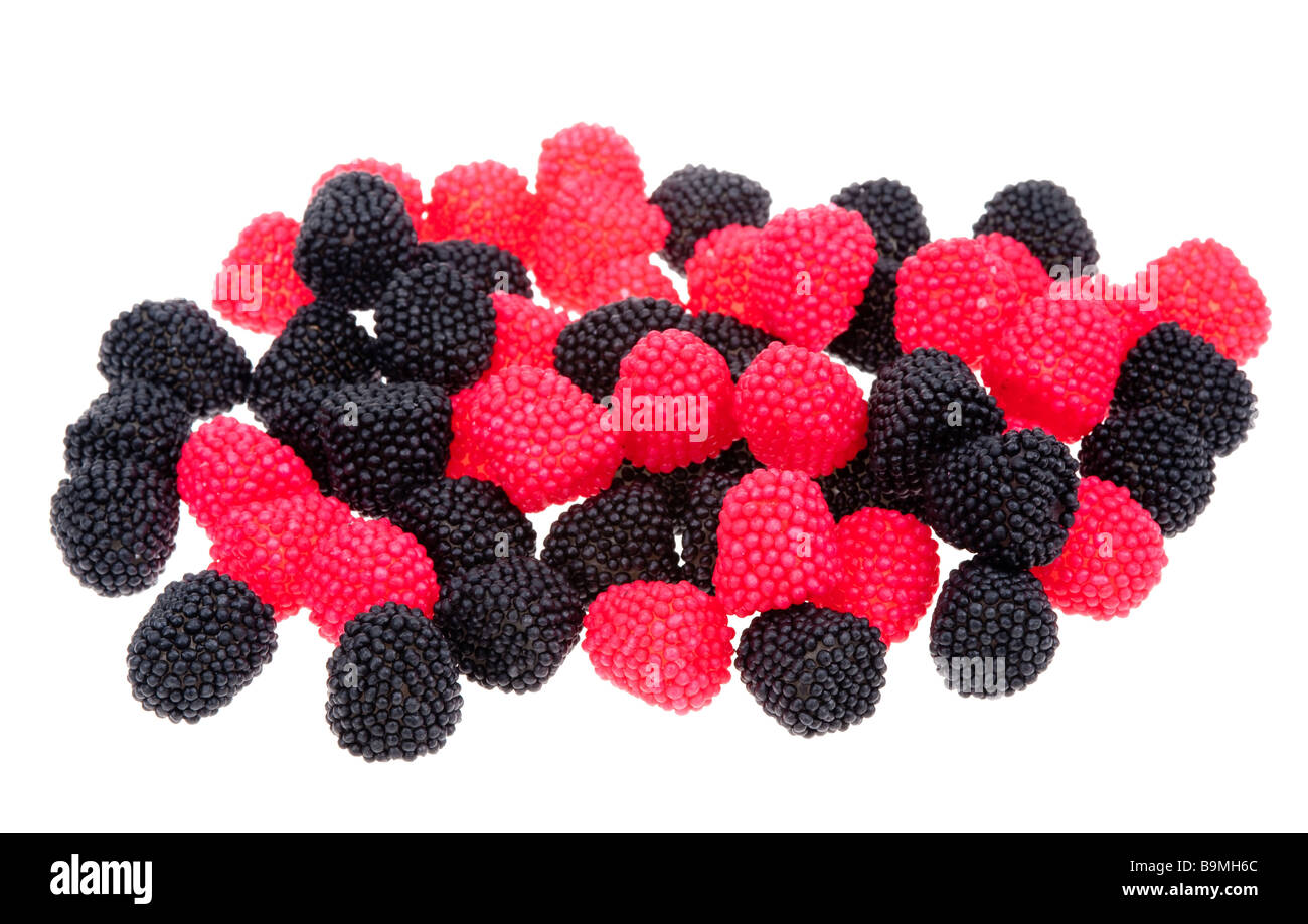 black and red berry shaped candies isolated on a white background Stock ...