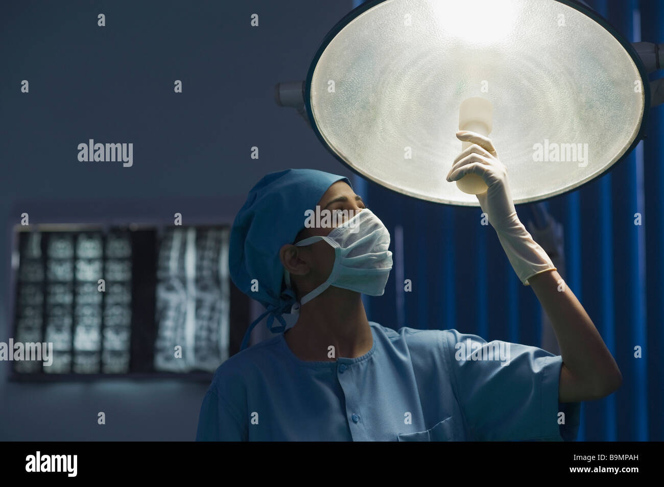 Surgical glove with instrument hi-res stock photography and images - Alamy