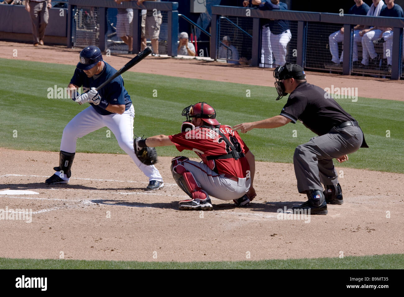 A San Diego Padre bats against the Arizona Diamondbacks in a spring ...