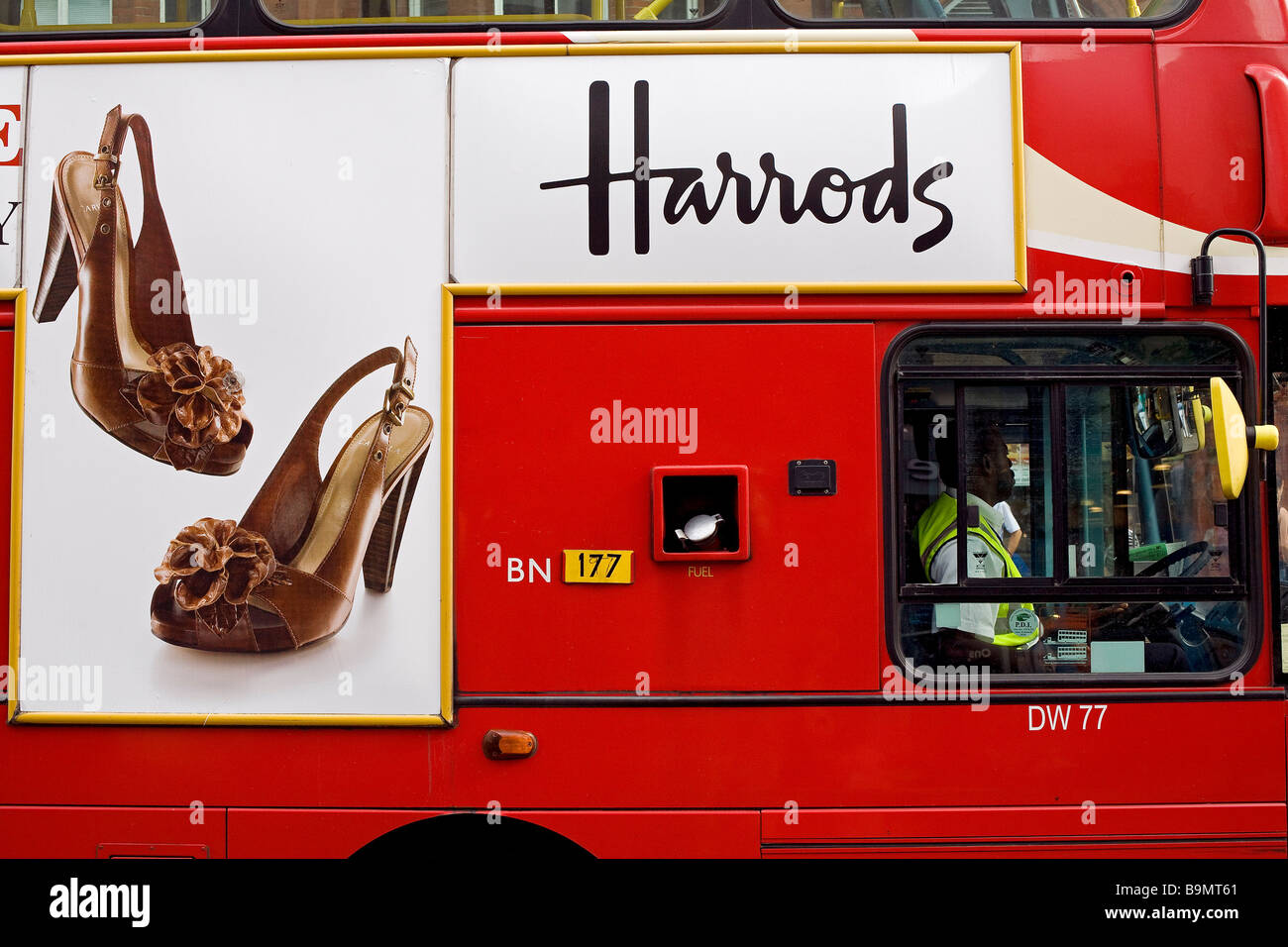 United Kingdom, London, advert for Harrods on a doubledecker bus Stock ...