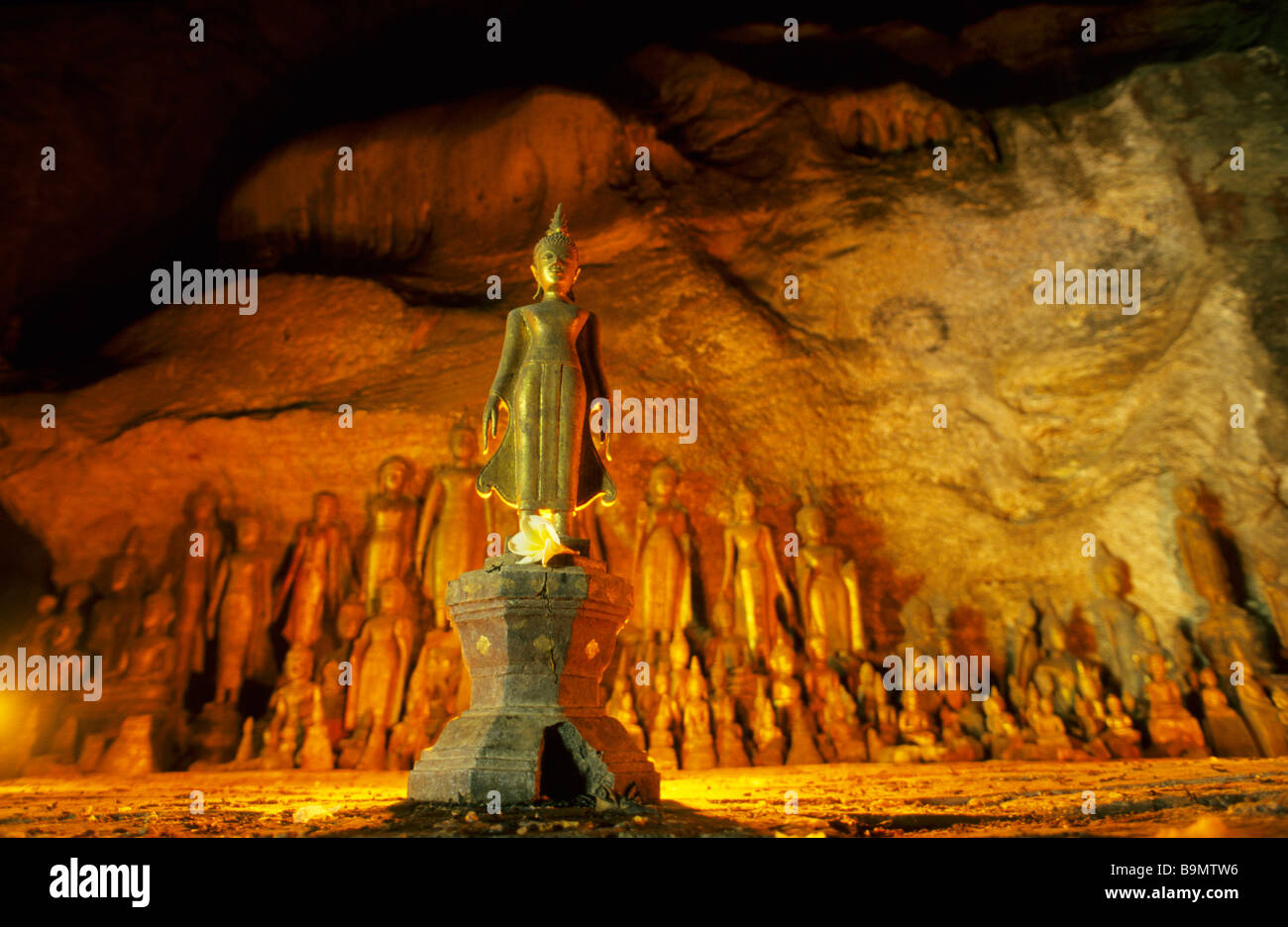 Laos, Pak Ou Caves, near Luang Prabang, Buddha statuettes Stock Photo ...