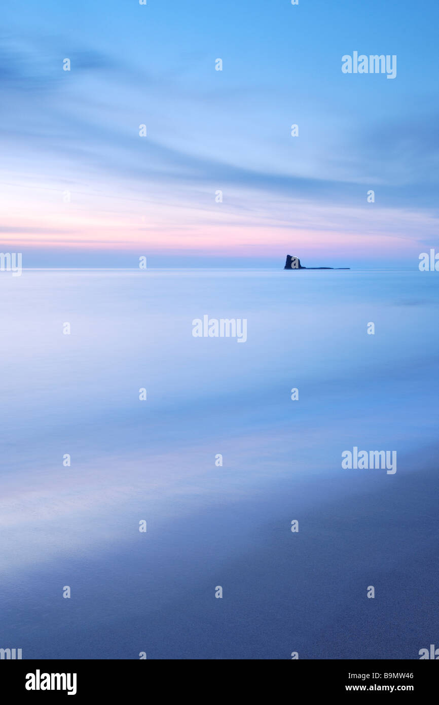 The sea stack Black Nab at sunrise in Saltwick Bay near Whitby ...