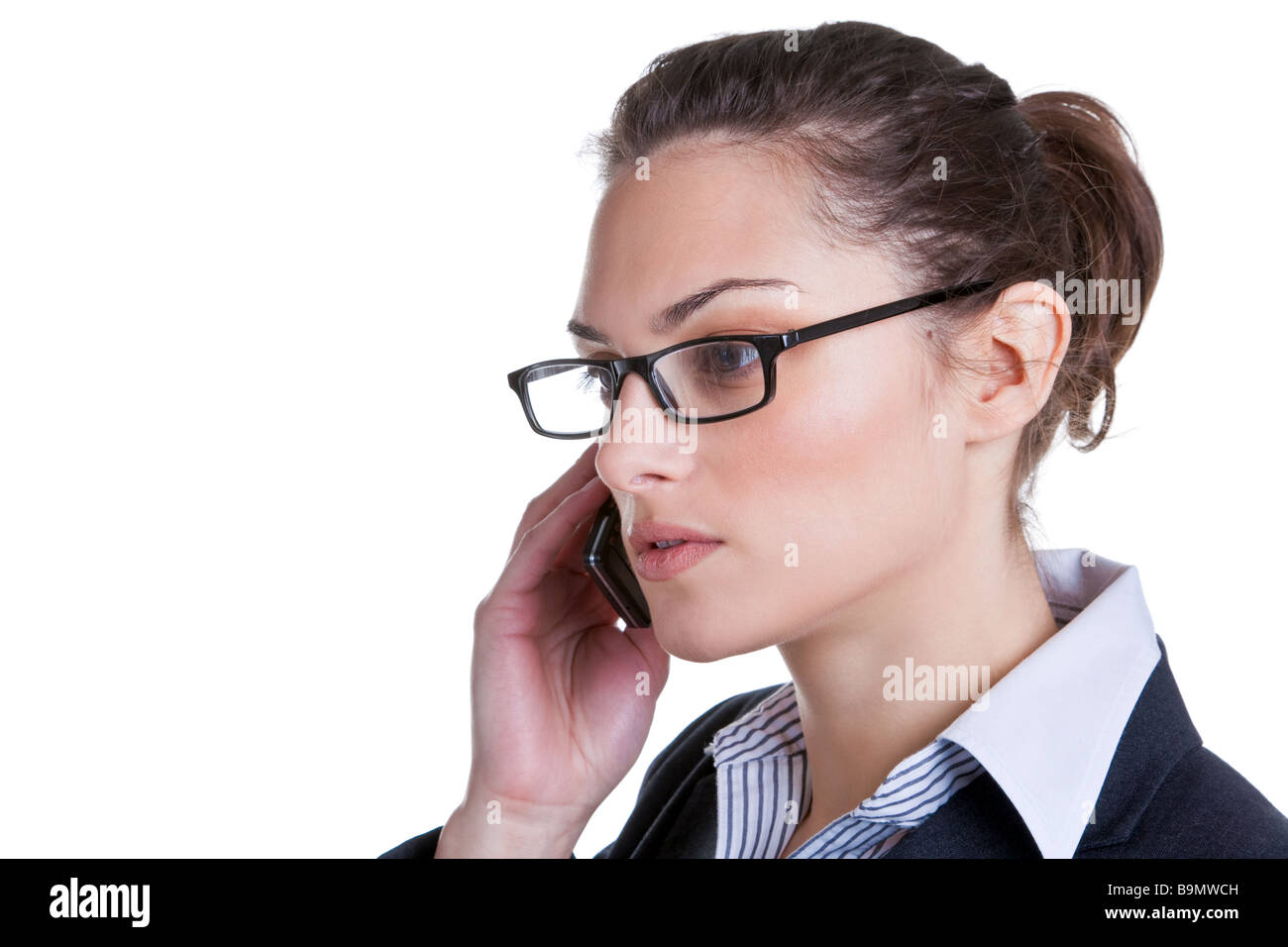Attractive businesswoman making a phonecall isolated on white ...