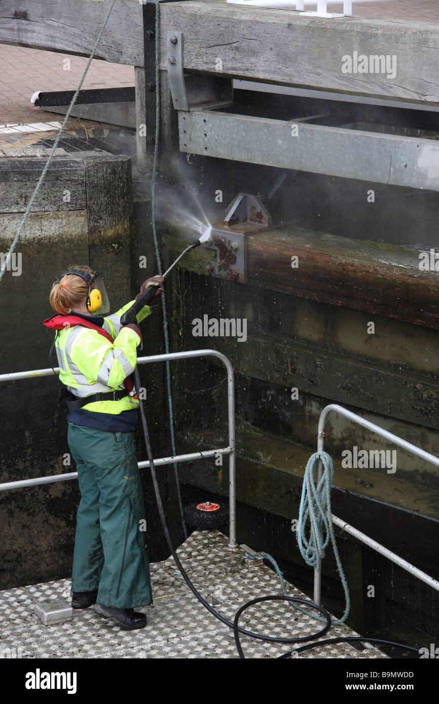 river medway lock gate cleaning chamber men at work people person Stock ...