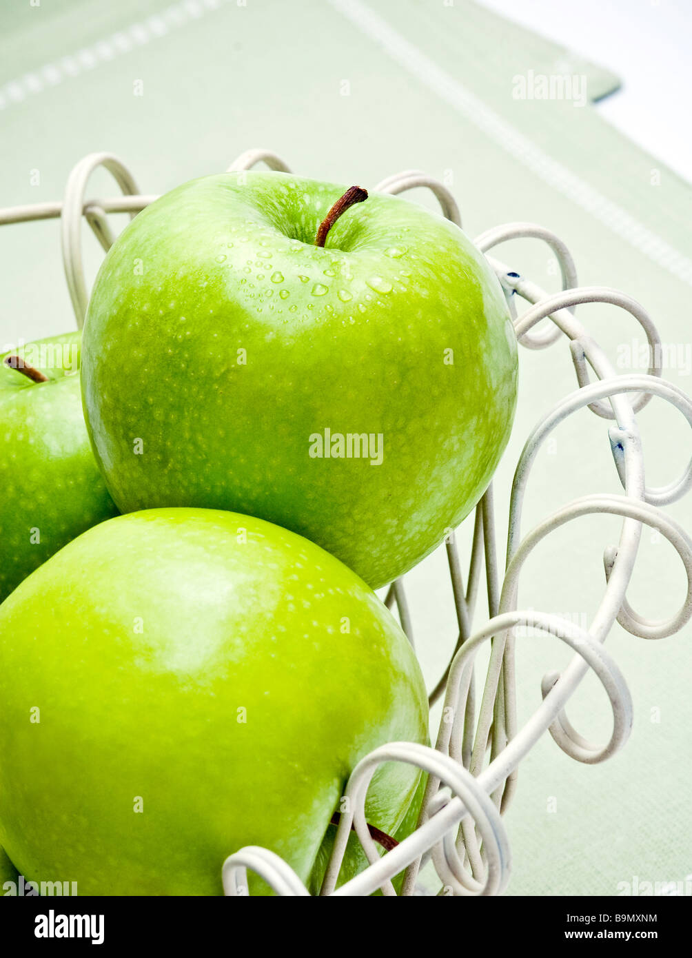 Three green apples hi-res stock photography and images - Alamy