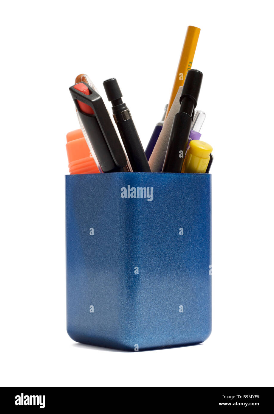 Blue desk tidy containing pens and pencils on white background Stock ...