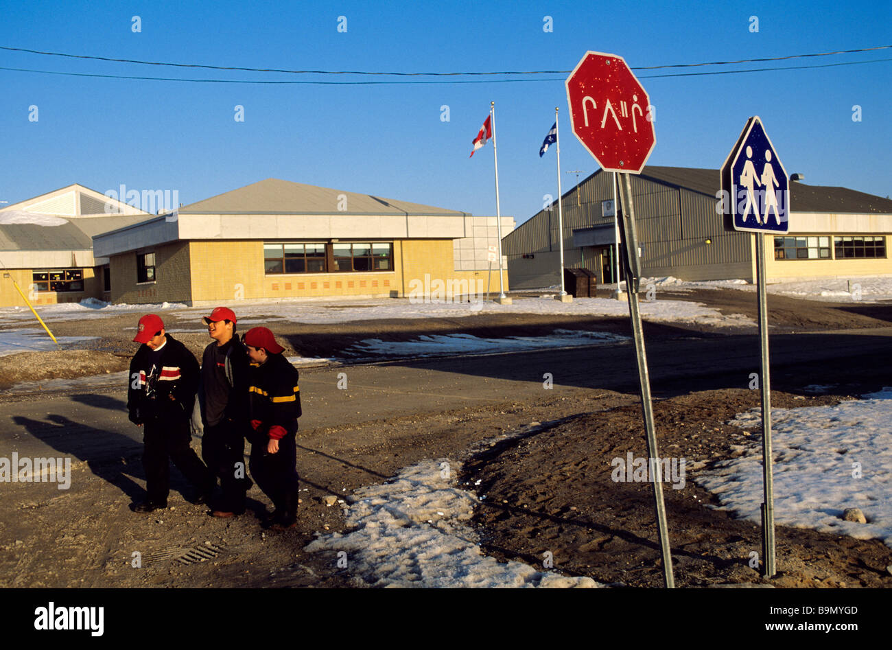 Canada, Quebec Province, James Bay, Wemidji village, teenagers walking ...