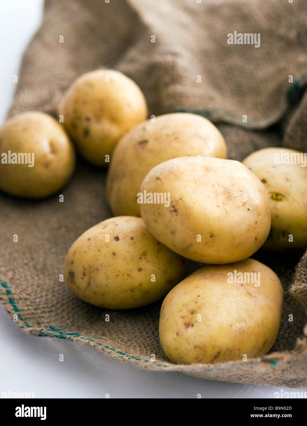 Many potatoes in sack hi-res stock photography and images - Alamy