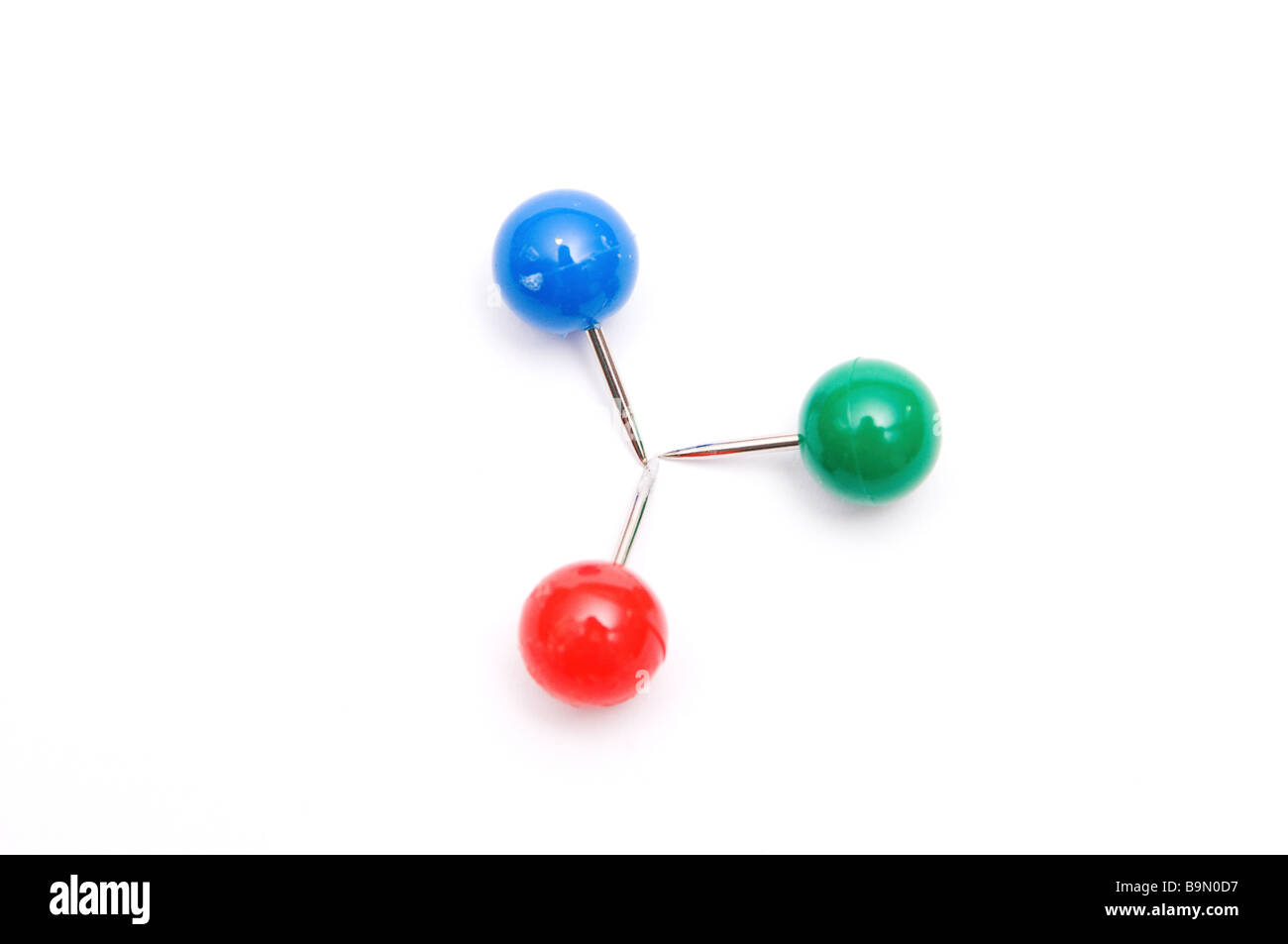 color pins isolated on a white background Stock Photo - Alamy