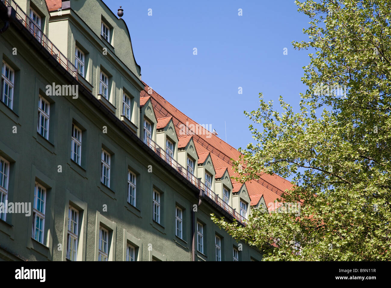 Green curved building Munich Germany Stock Photo - Alamy