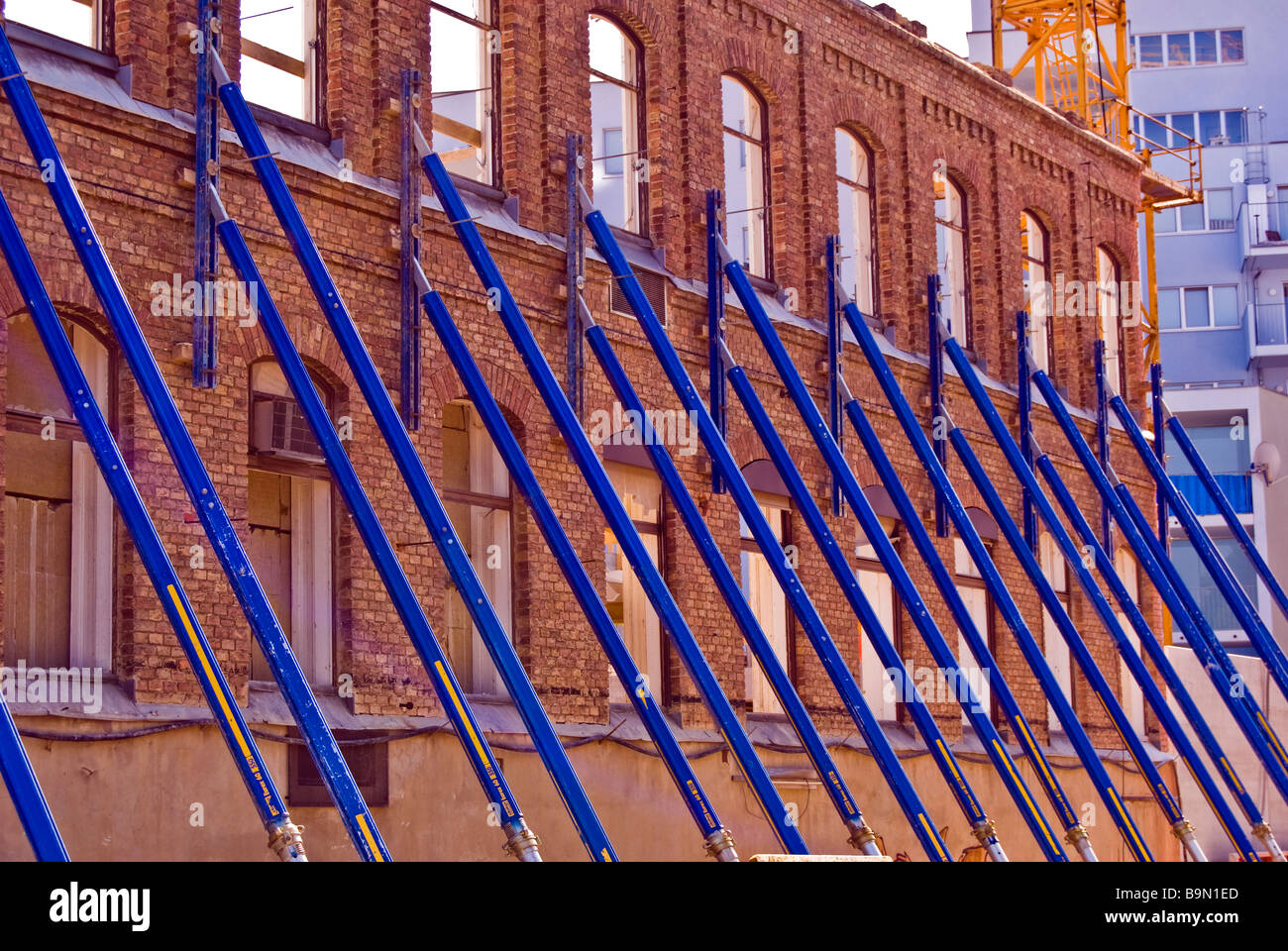 Metal props holding up a brick wall during redevelopment, Vienna ...