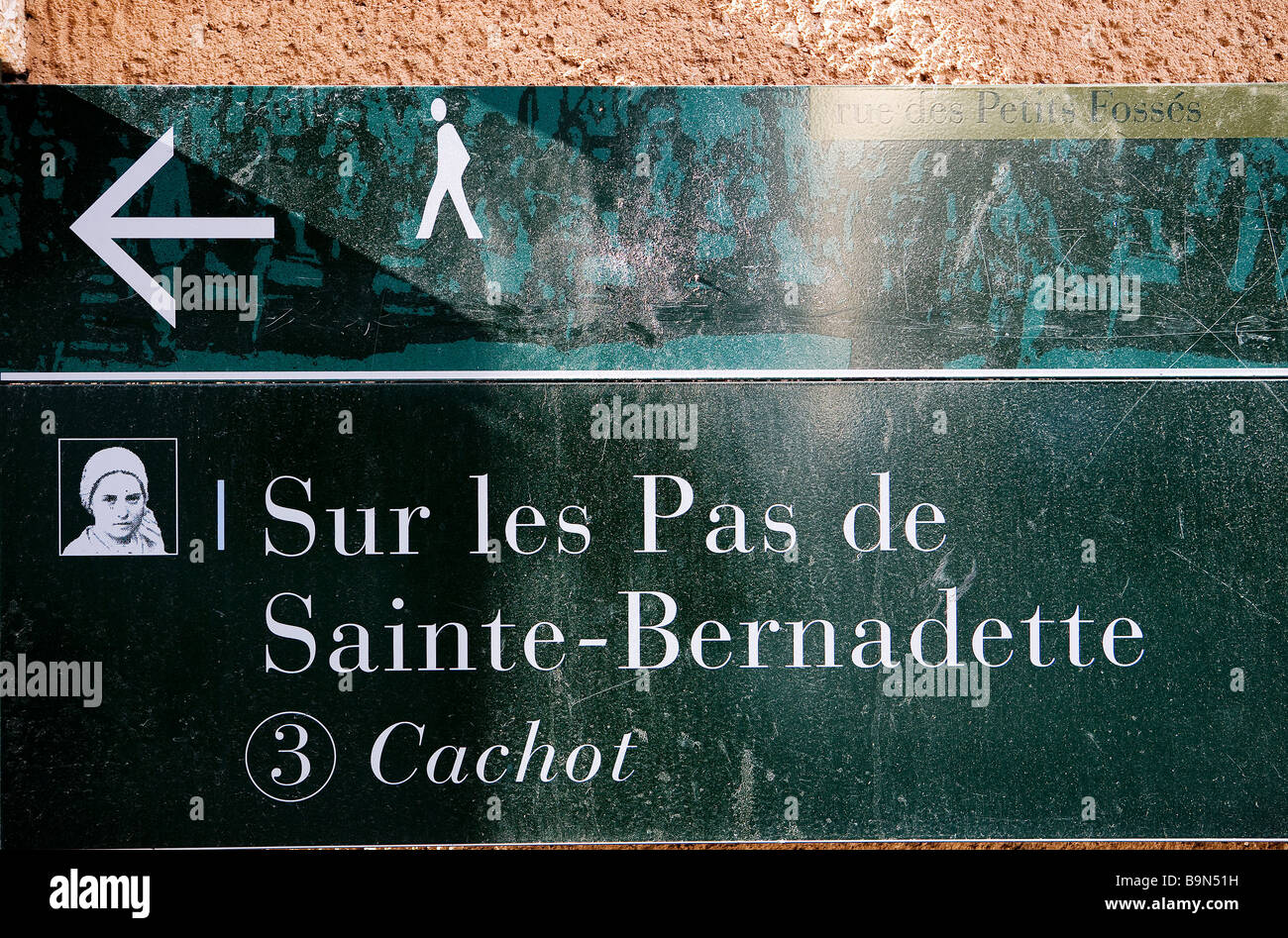 France, Hautes Pyrenees, Lourdes, sign about Sur les traces de ...