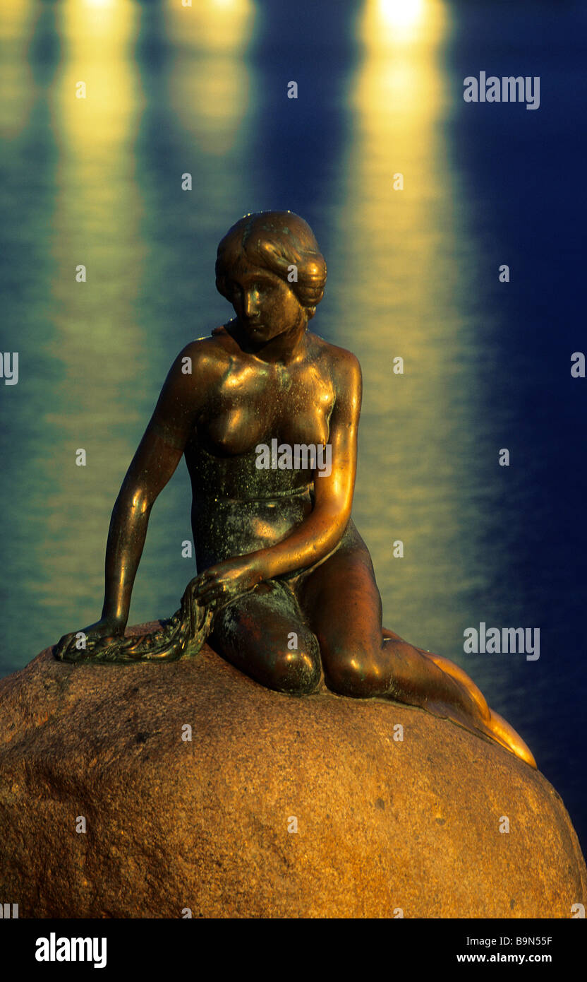 Denmark, Copenhagen, the Little Mermaid on its rock, a bronze statue by Edvard Eriksen, offered ...