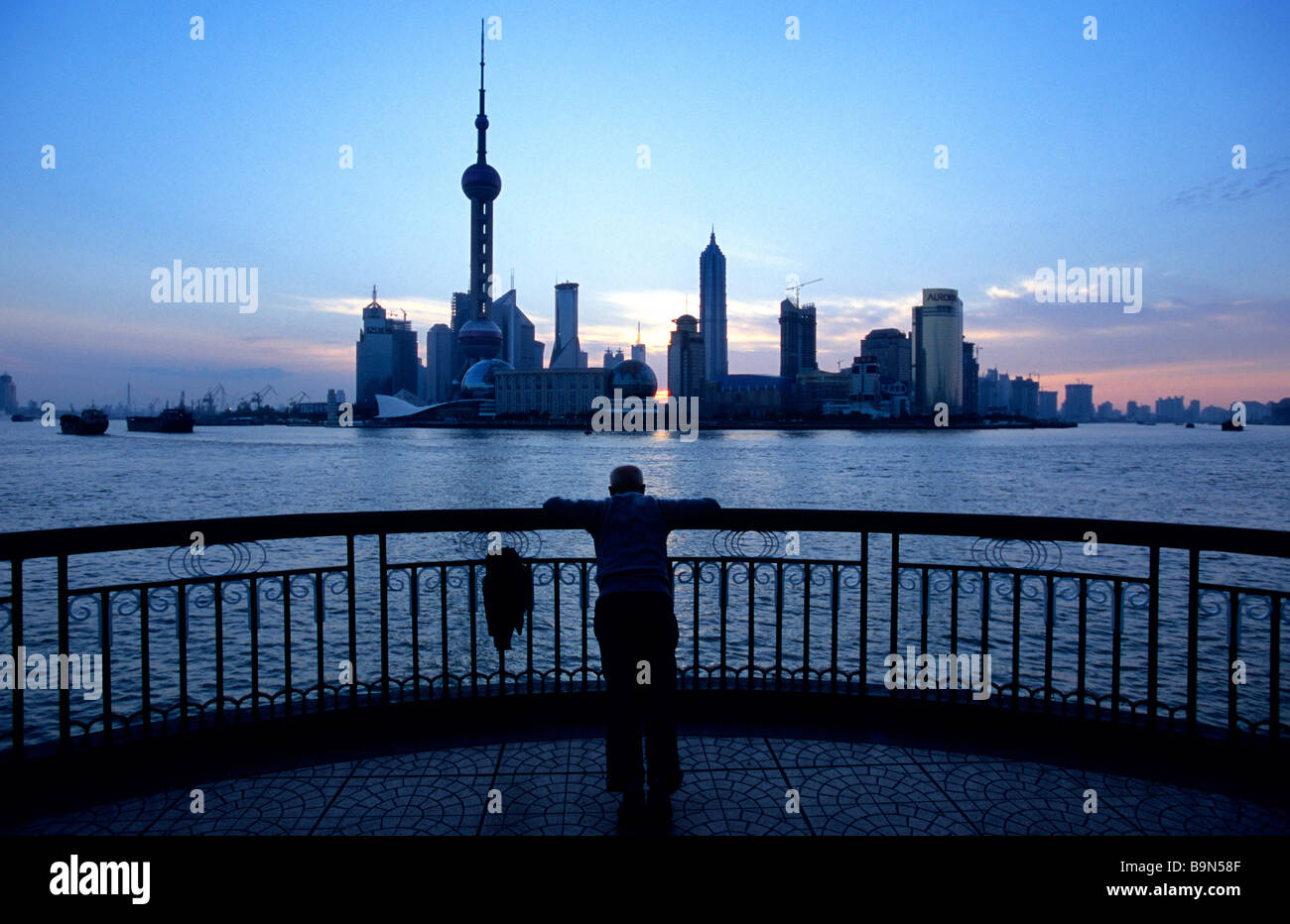 China, Shanghai, man on the Bund, view on Pudong Stock Photo - Alamy