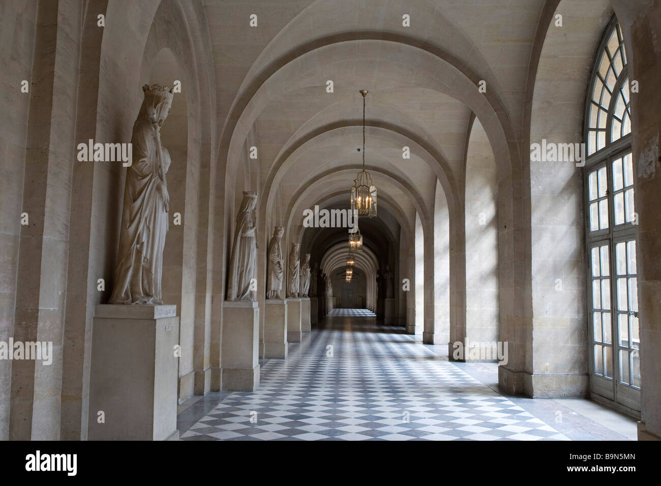 One of the many corridors in The Palace of Versailles, France ...