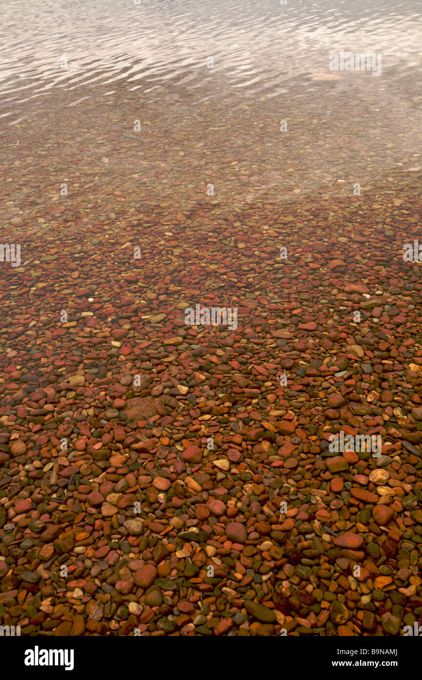 Pebbles on lake bottom Stock Photo - Alamy