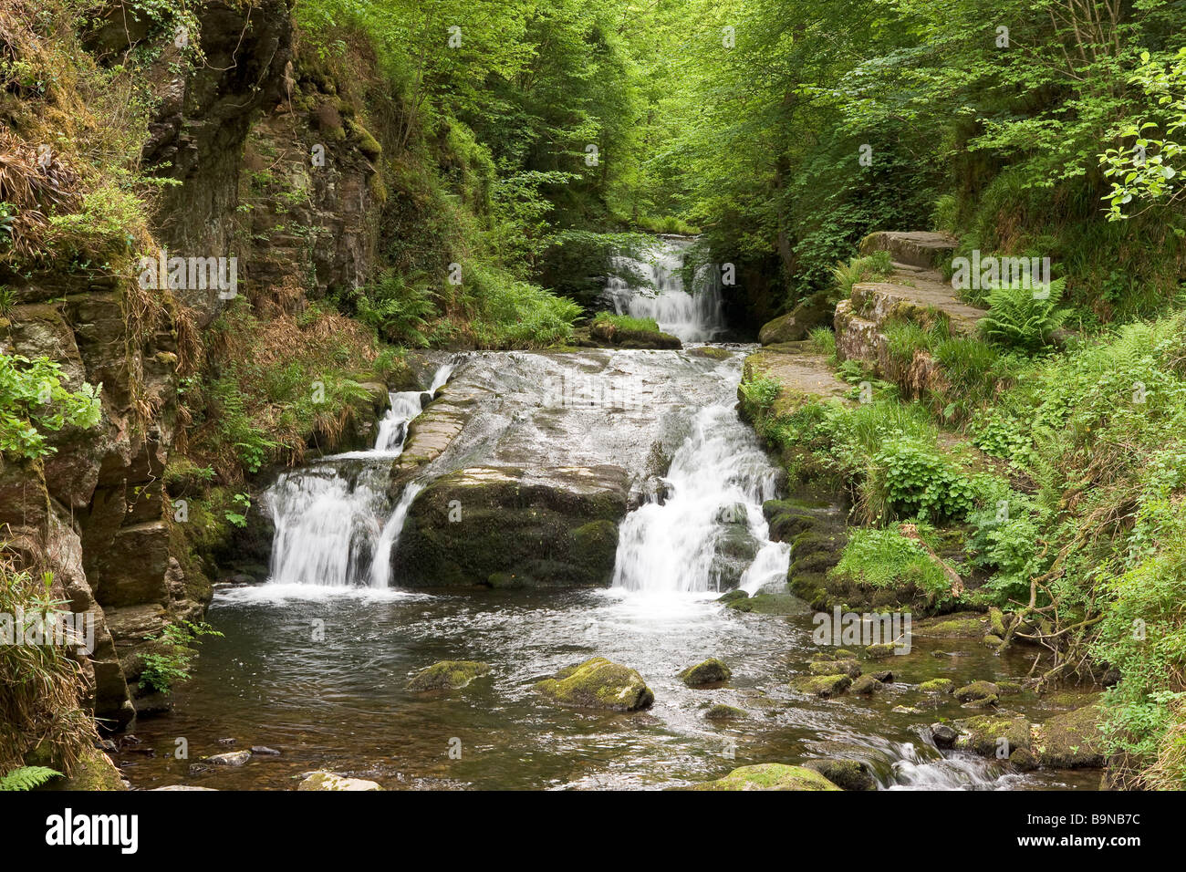 Small waterfalls in river at Watersmeet, Devon Stock Photo - Alamy