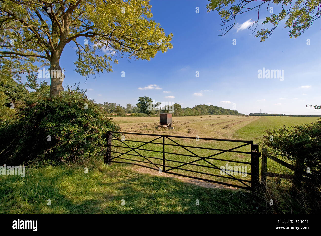 Farm Gate In To A Hay Field Stock Photo - Alamy