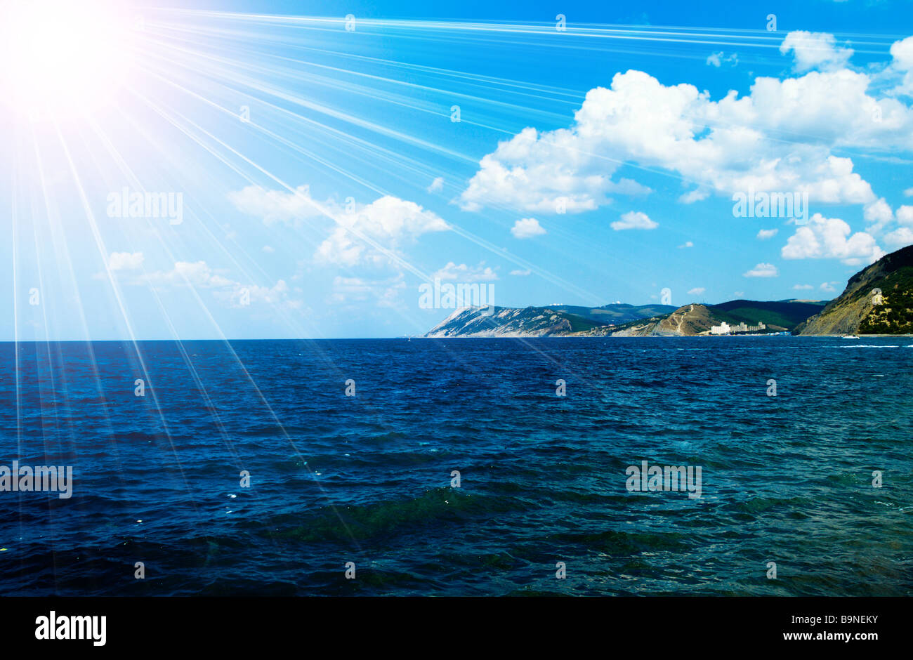 Blue sky over water Stock Photo - Alamy